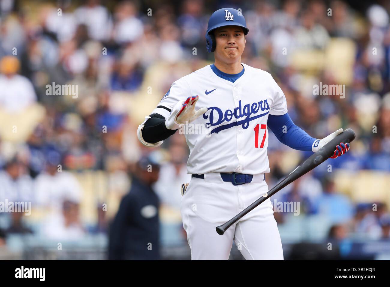 Los Angeles Dodgers designated hitter Shohei Ohtani (17) gestures ...