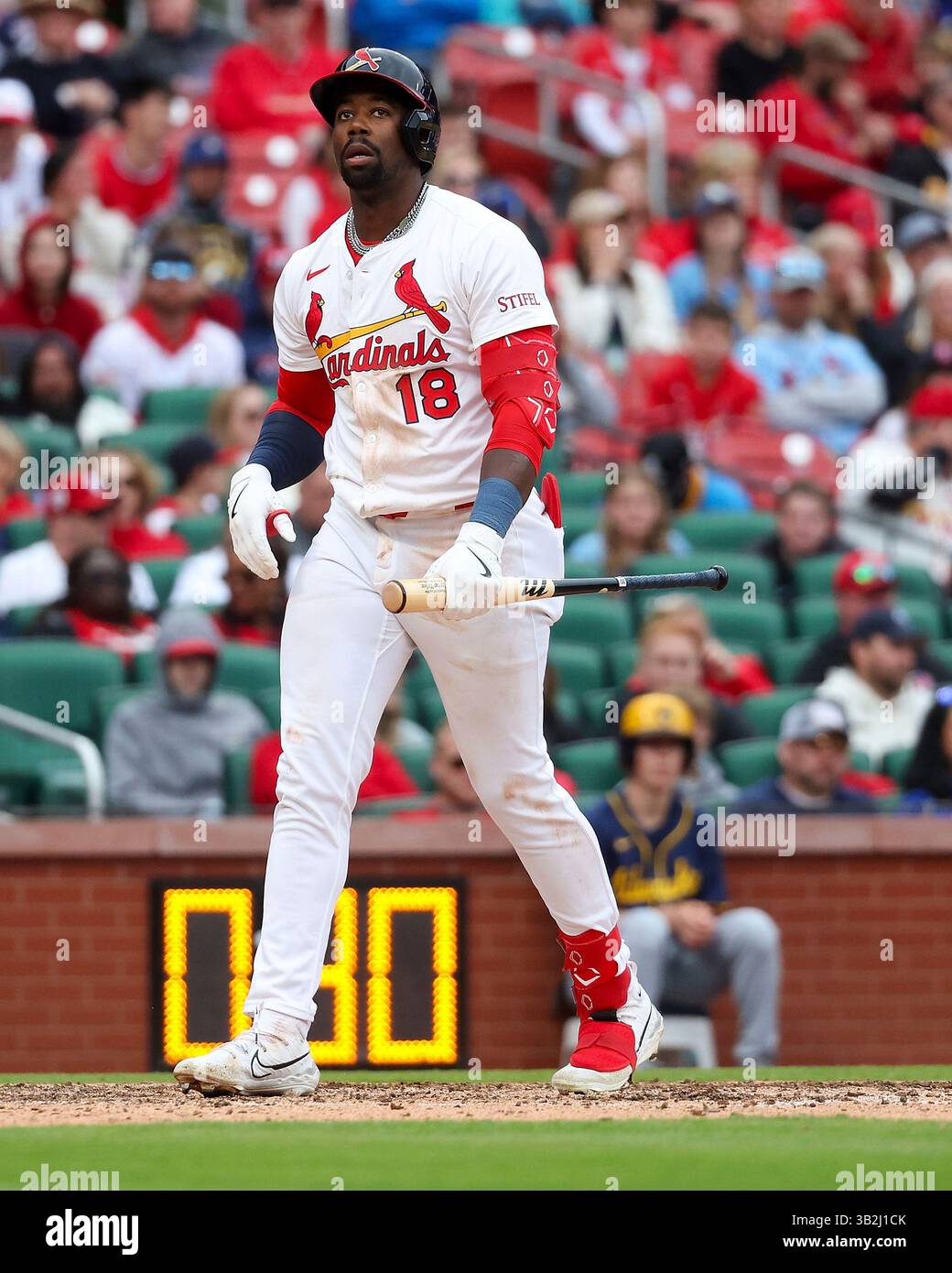 St. Louis Cardinals' Jordan Walker returns to the dugout sfter striking ...