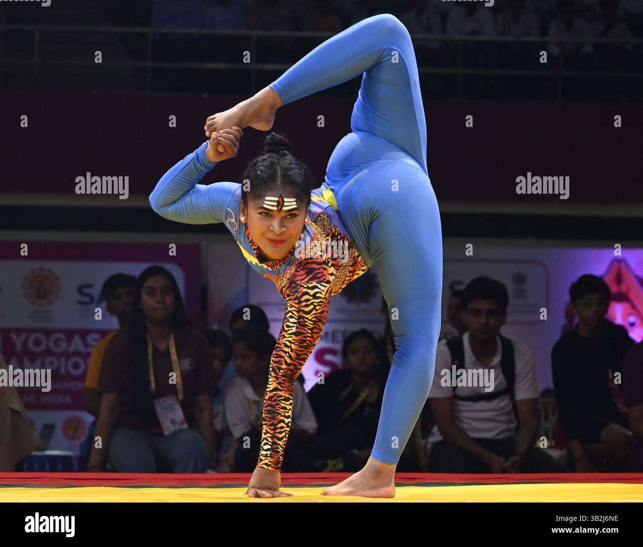 NEW DELHI, INDIA - APRIL 26: Participants perform yoga during the 2nd ...