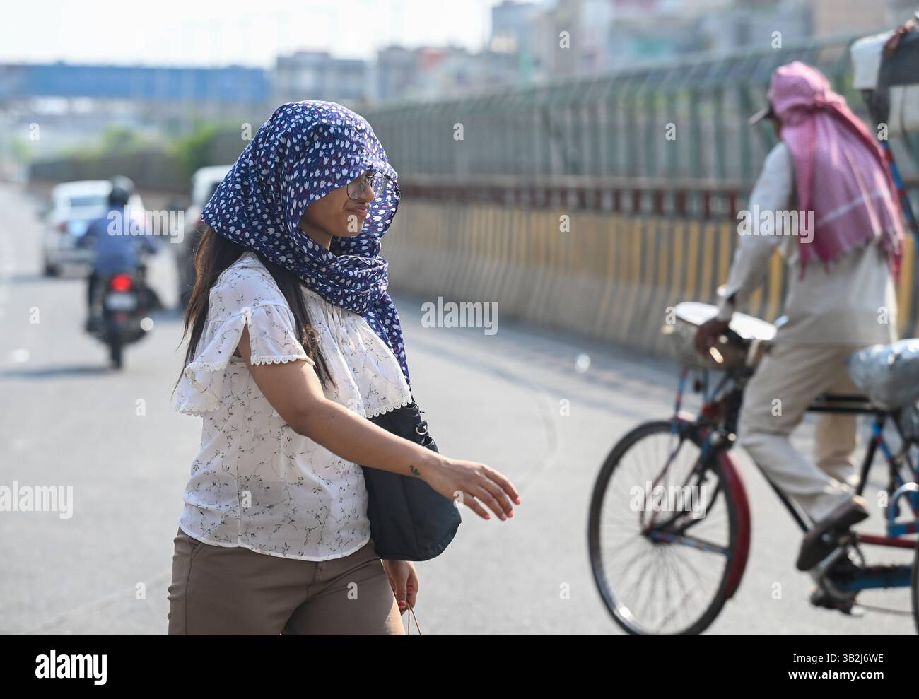NOIDA, INDIA - APRIL 27: As temperatures rise in Delhi-NCR, commuters ...