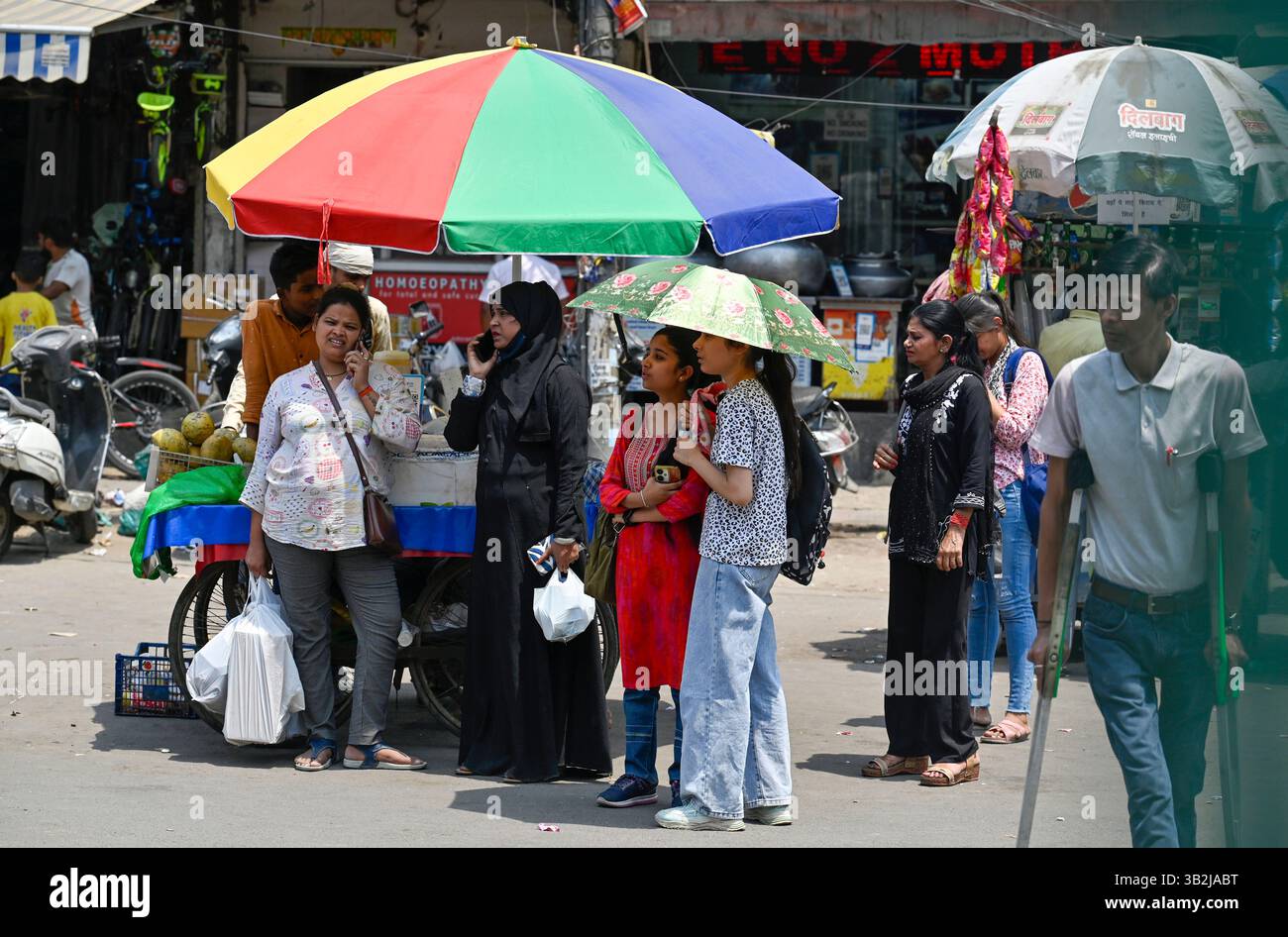 NEW DELHI, INDIA - APRIL 26: Visitors brave the heat wave during a hot ...
