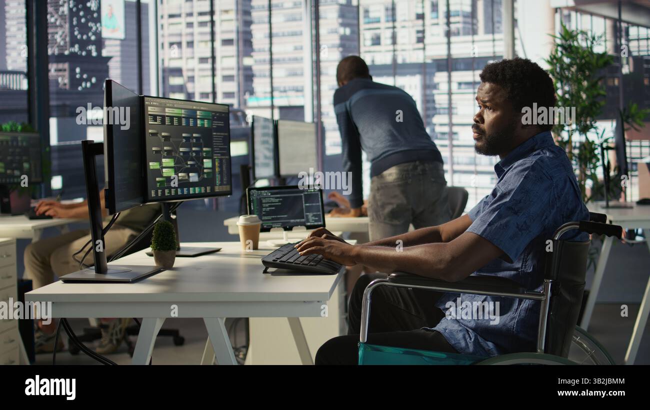 Software technician with disability in inclusive workplace working with machine learning tech ...