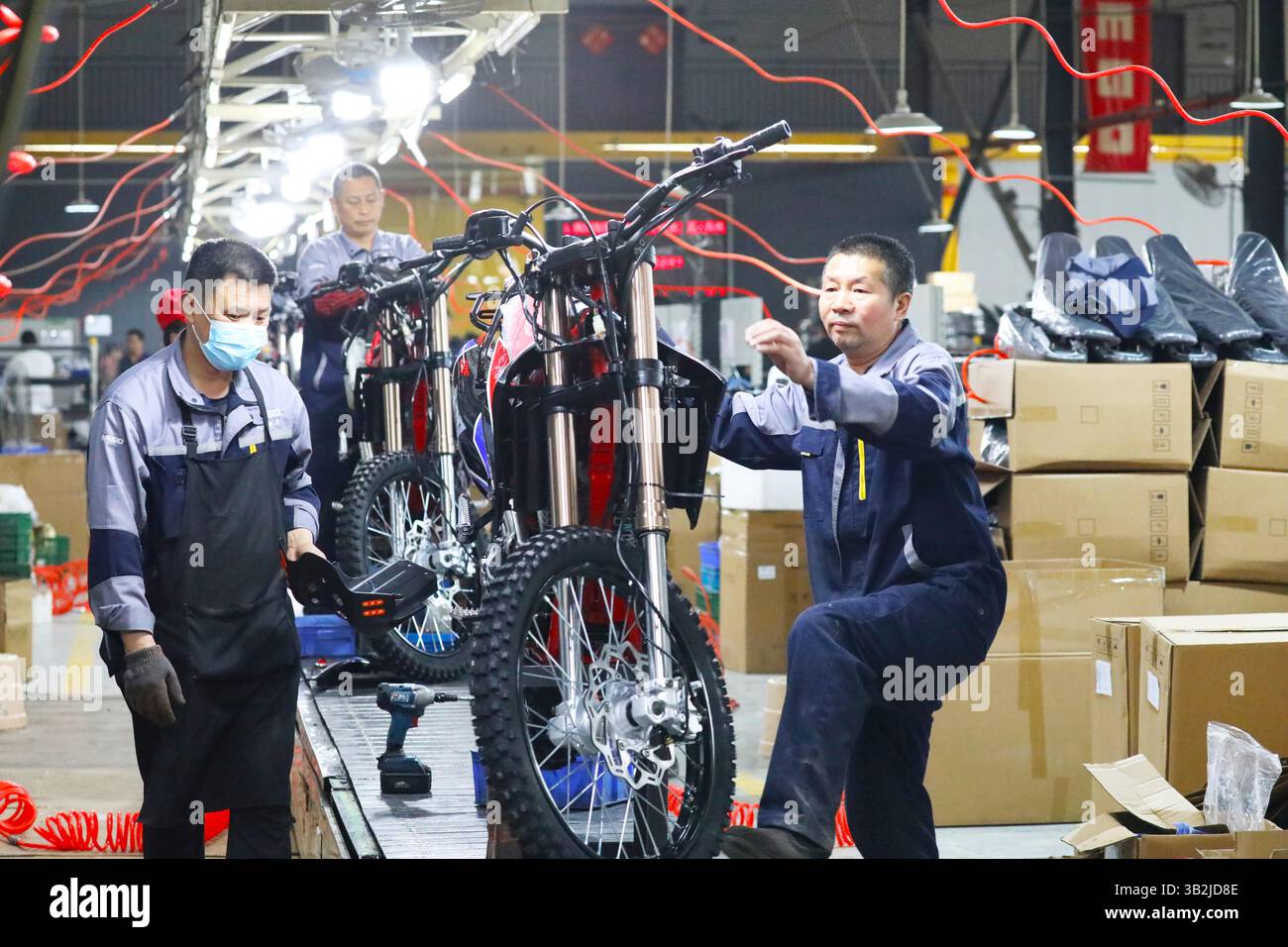 CHONGQING, CHINA - APRIL 26, 2025 - Workers are manufacturing ...