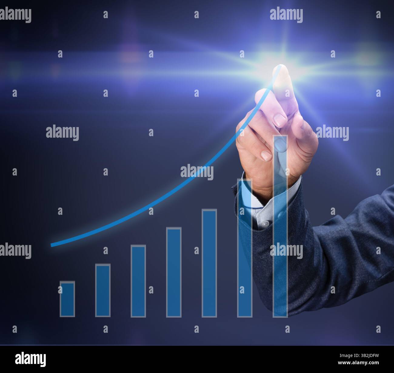Businessman drawing a virtual graph illustrating upward trends in ...