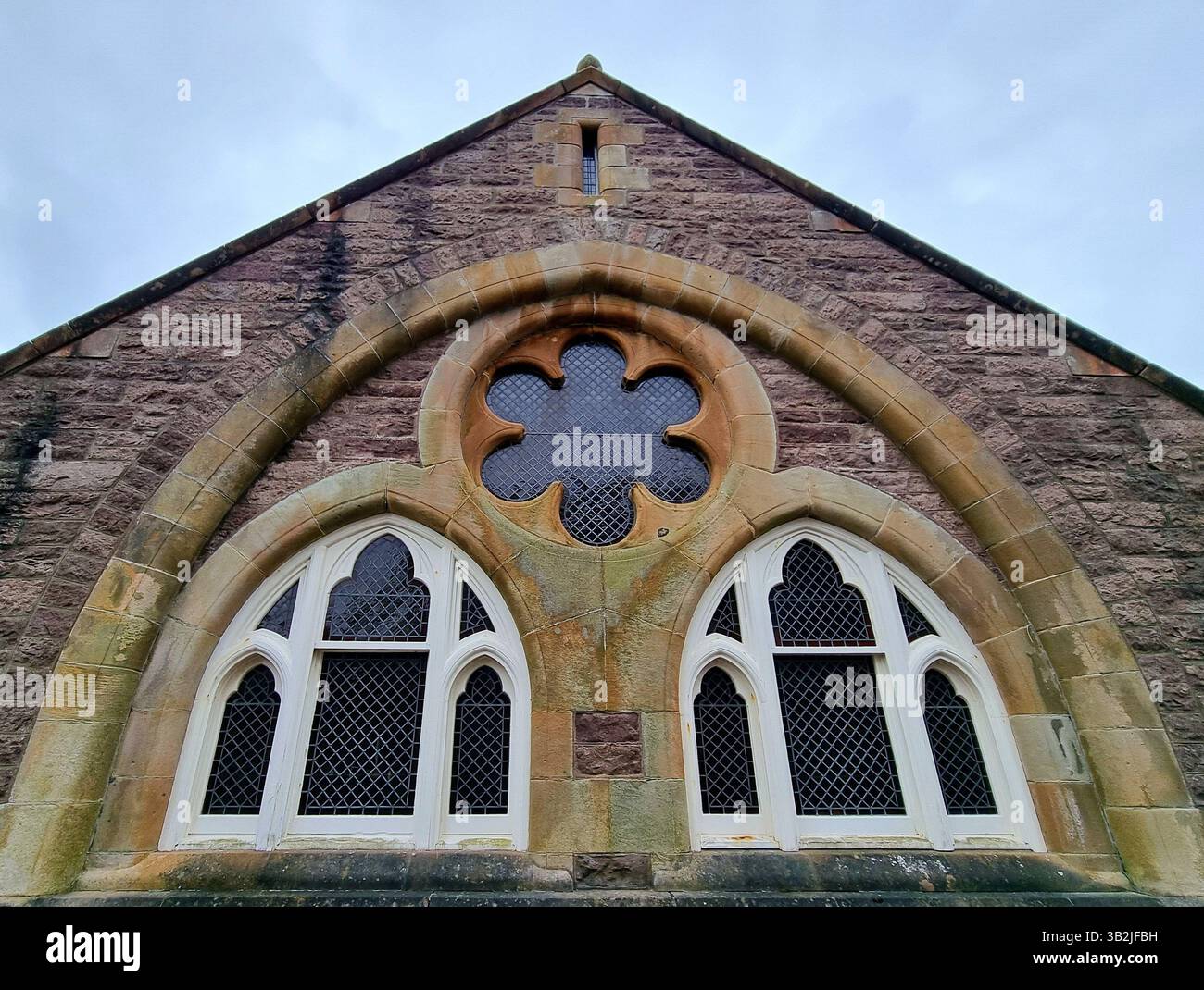 Fragment of the facade of Martin's Memorial Hall church made of red ...