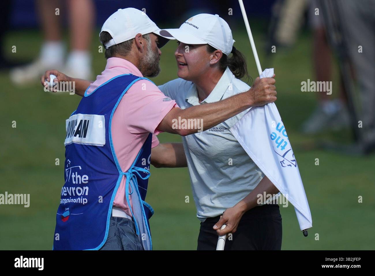 Lindy Duncan speaks with her caddie on the 18th green during the final ...