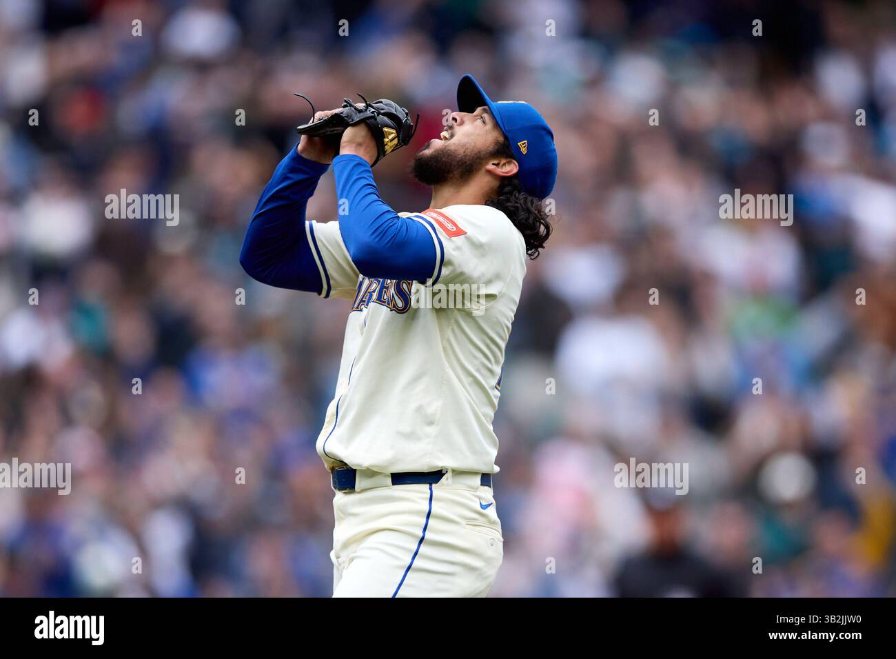 Seattle Mariners pitcher Andrés Muñoz reacts after the final out of a ...