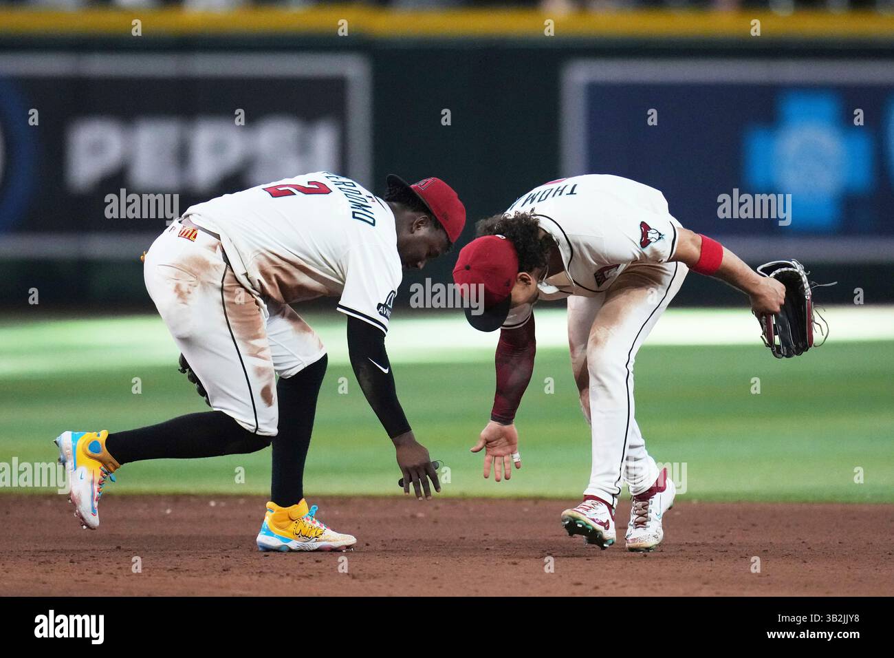 Arizona Diamondbacks' Geraldo Perdomo (2) celebrates a win against the ...