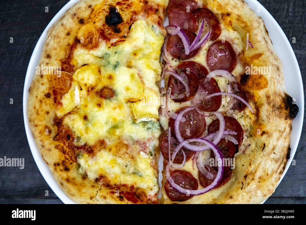 The most authentic Brazilian pizza, half pepperoni, onion and half four ...