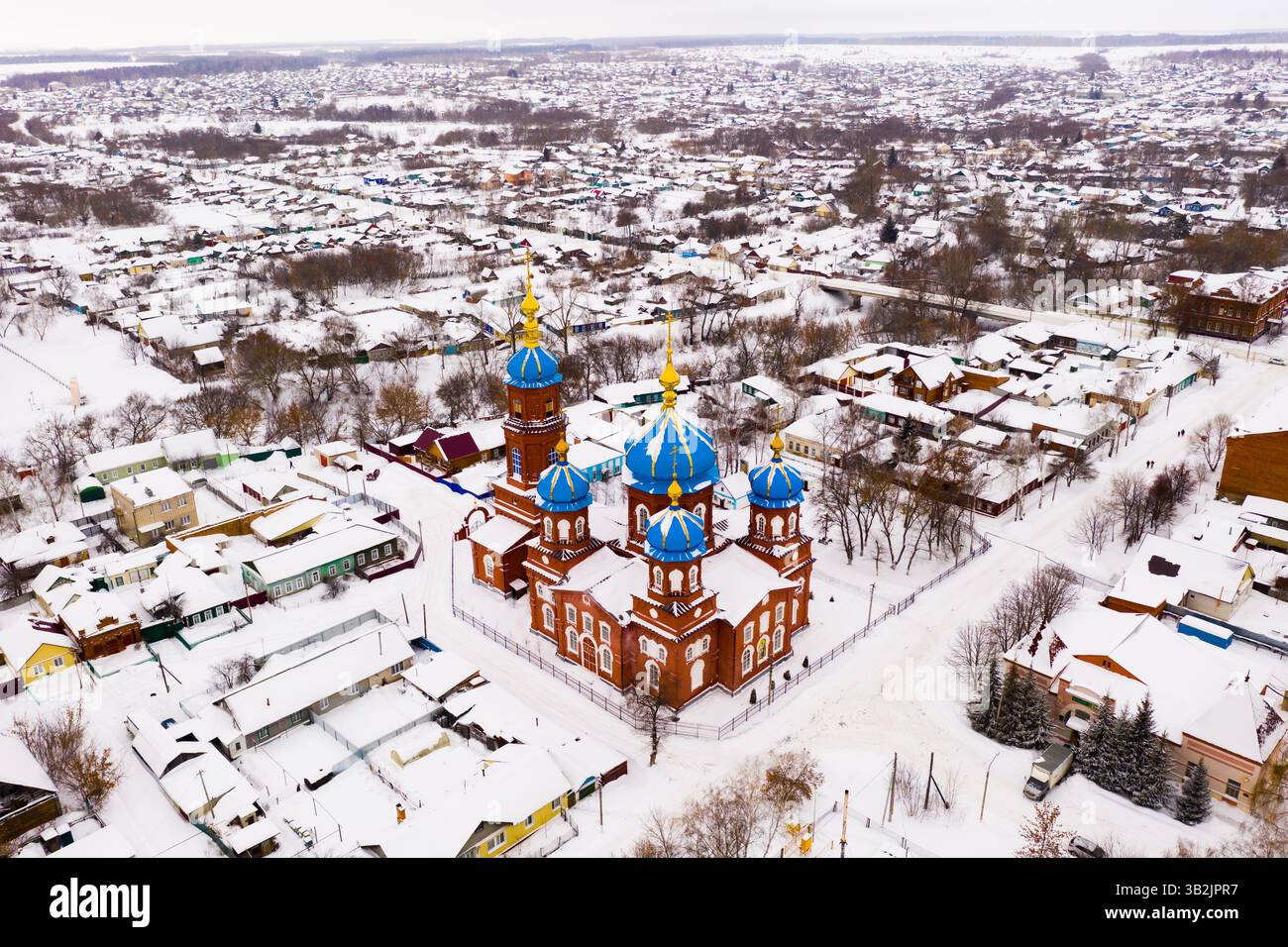 Snow covered Petrovsk cityscape with Church of Intercession of Holy ...