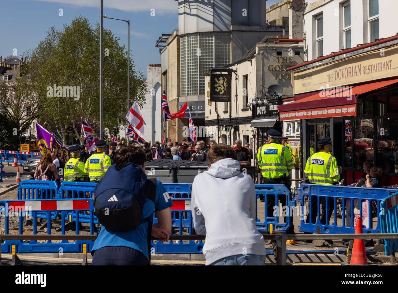 Dover, UK. 27 APR, 2025. People watch on as protestors finish their ...