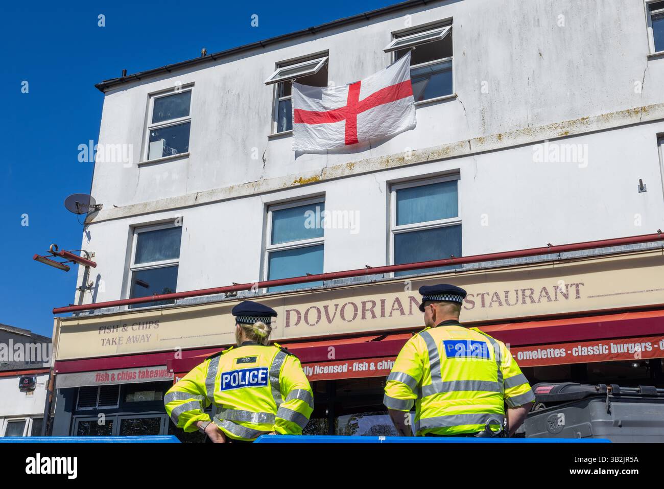 Dover, UK. 27 APR, 2025. England flag flies out of a window as around ...