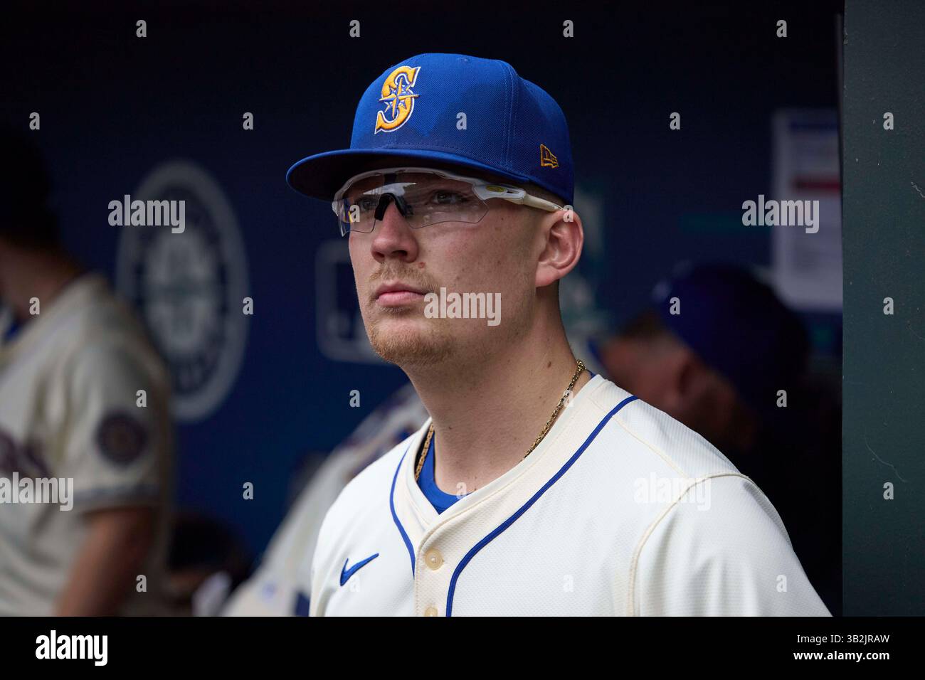 Seattle Mariners starting pitcher Logan Evens prepares to walk to the ...