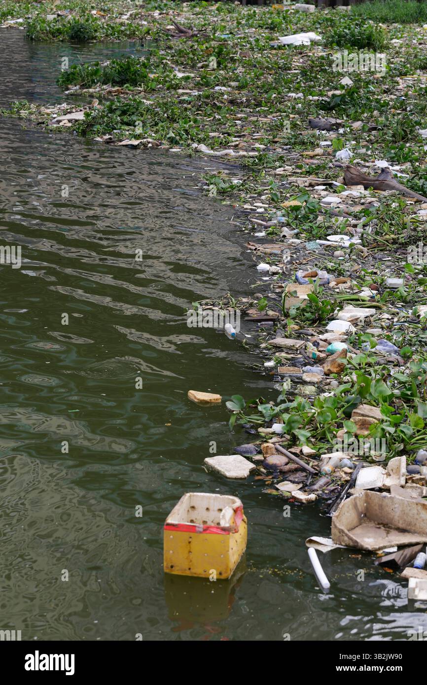 Aerial view of trash polluting the Saigon river, downtown Ho Chi Minh ...