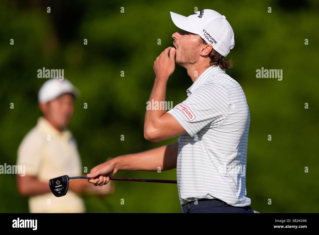 Rasmus Hojgaard, of Denmark, reacts on the 16th green during the final ...