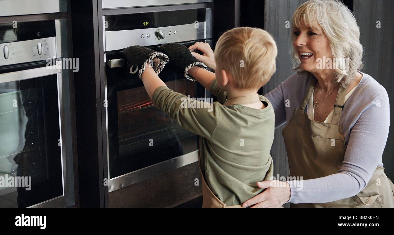 Oven, cooking and mature woman with child in kitchen together with love ...
