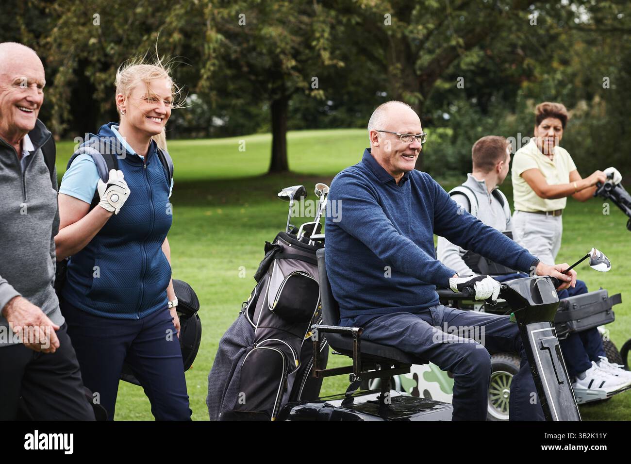 Sports, people with disability and friends for golf game, match and competition on golfing ...