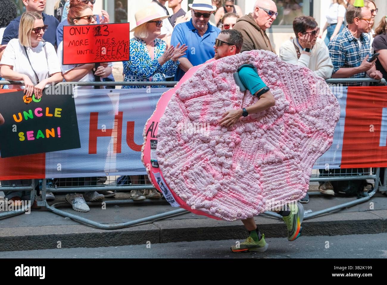 A participant wearing a brain costume atempts a world record for the ...