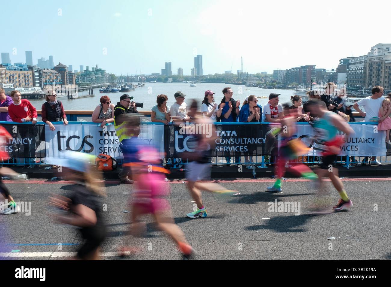 Runners cross Tower Bridge during the 45th London Marathon, which is on ...