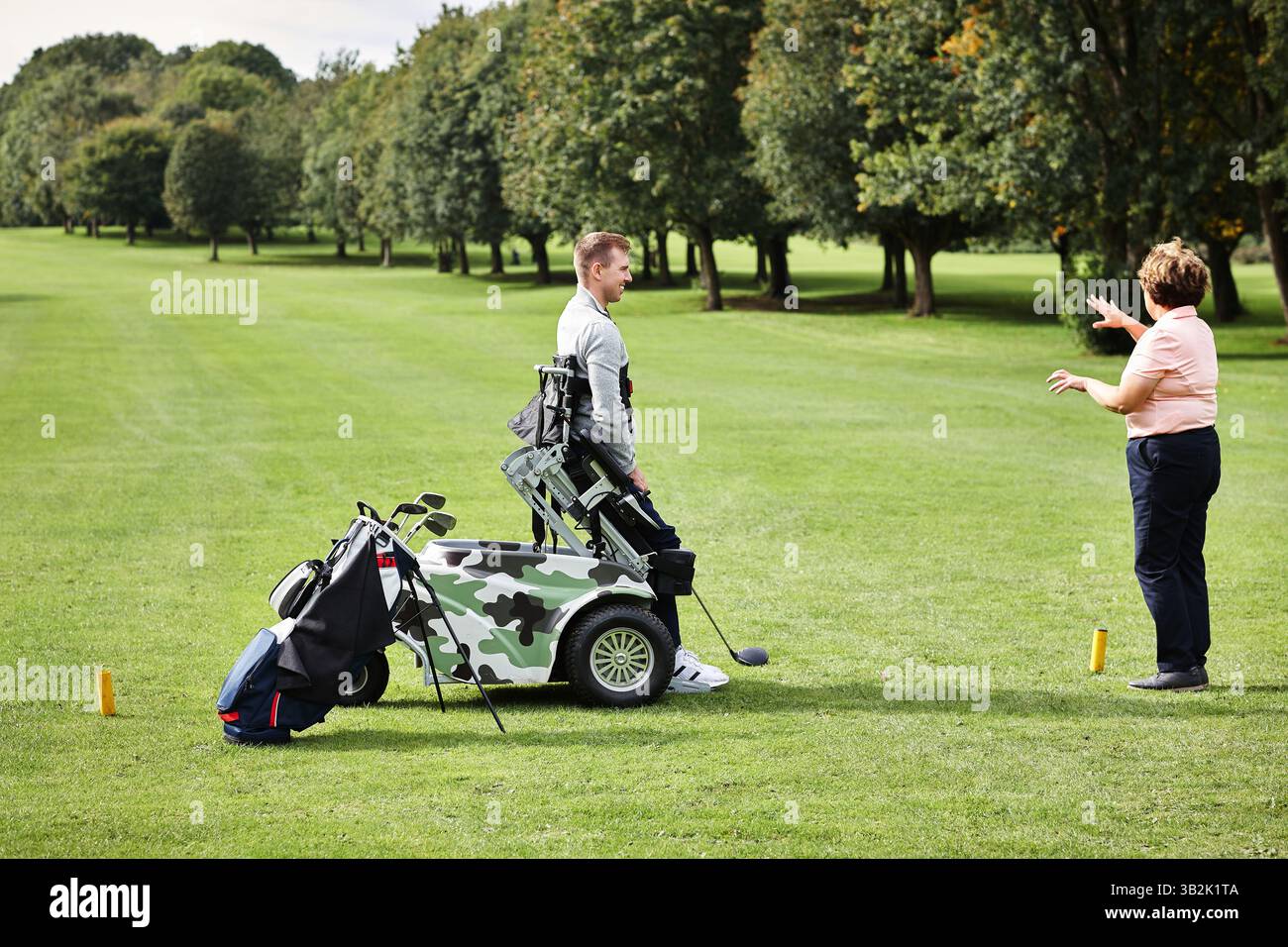 Sports, person with disability and trainer for golf in game, match and ...