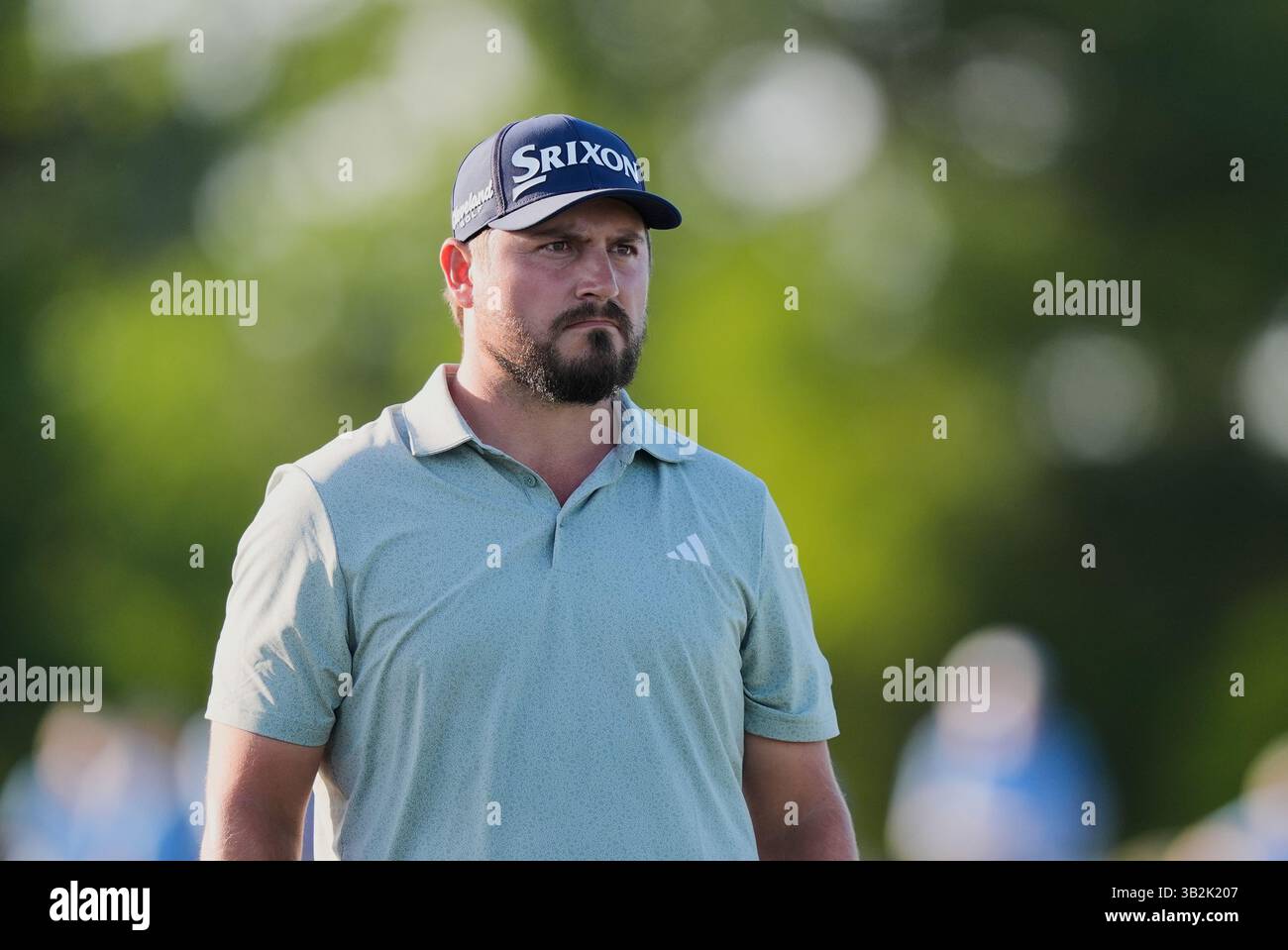 Andrew Novak watches his shot off the 17th tee during the final round ...
