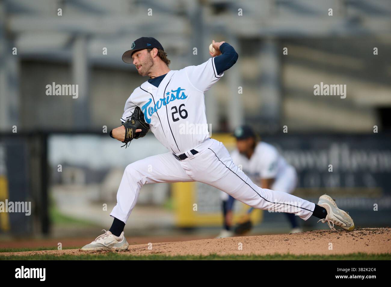 Asheville Tourists starting pitcher Nick Swiney (26) delivers a pitcher ...