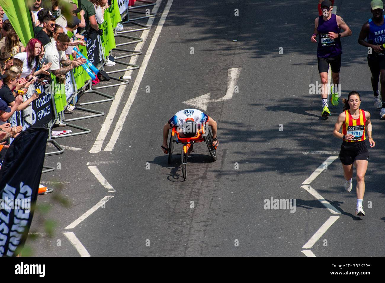 An wheelchair athlete is heading towards the Parliament Square in ...