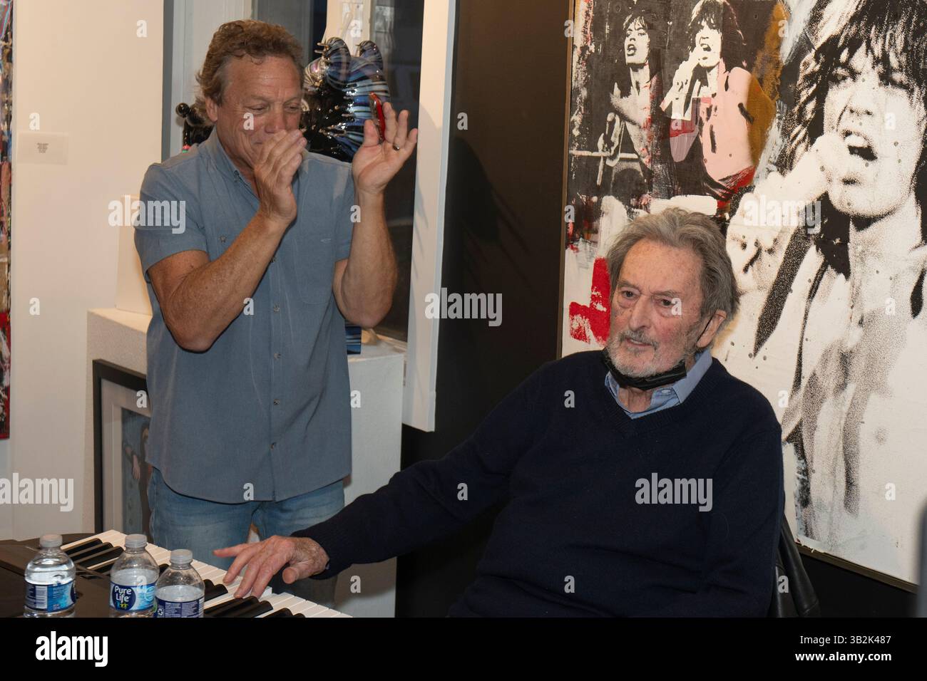 Brad Beyer performing with Rick Davies at Photographer and Artist Steve ...