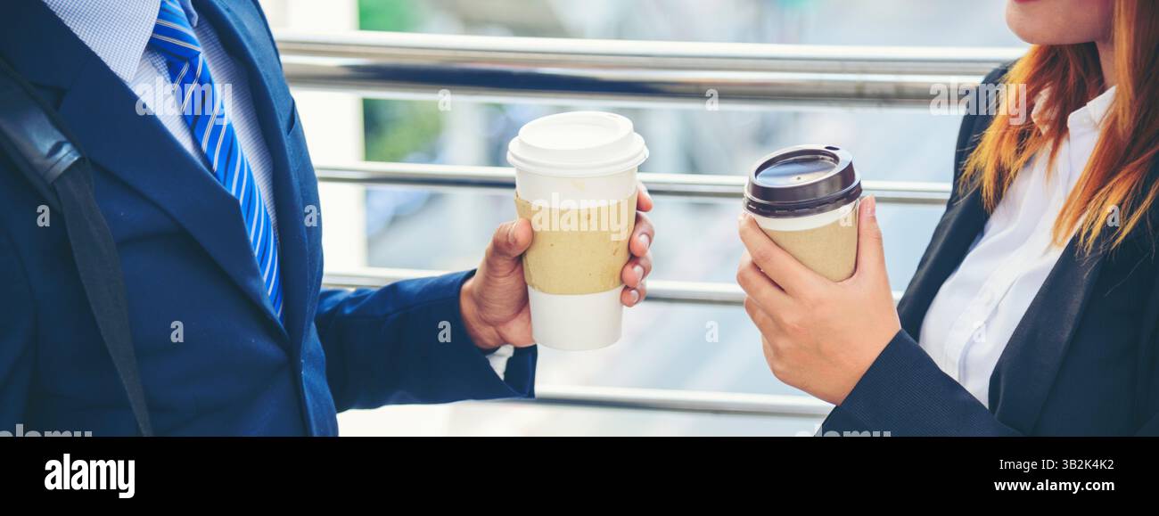 Banner Businessman Businesswoman drink coffee in town outside office ...