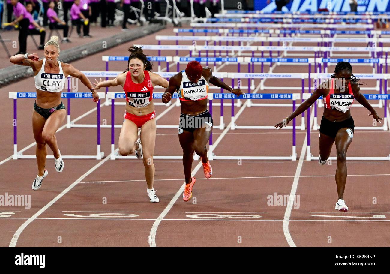 Xiamen,China.26th April 2025. China's Wu Yanni (L2) competes in the ...