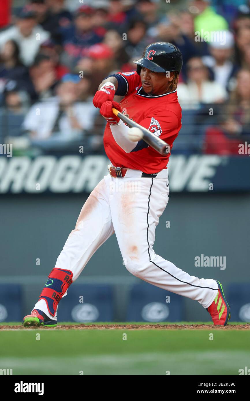 Jose Ramirez #11 of the Cleveland Guardians swings the bat in the third ...