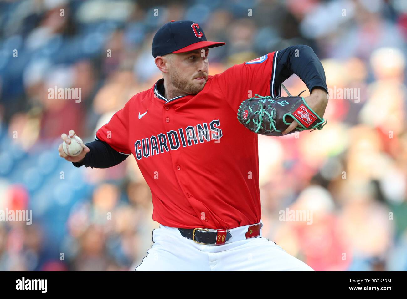 Tanner Bibee #28 of the Cleveland Guardians throws a pitch in the ...