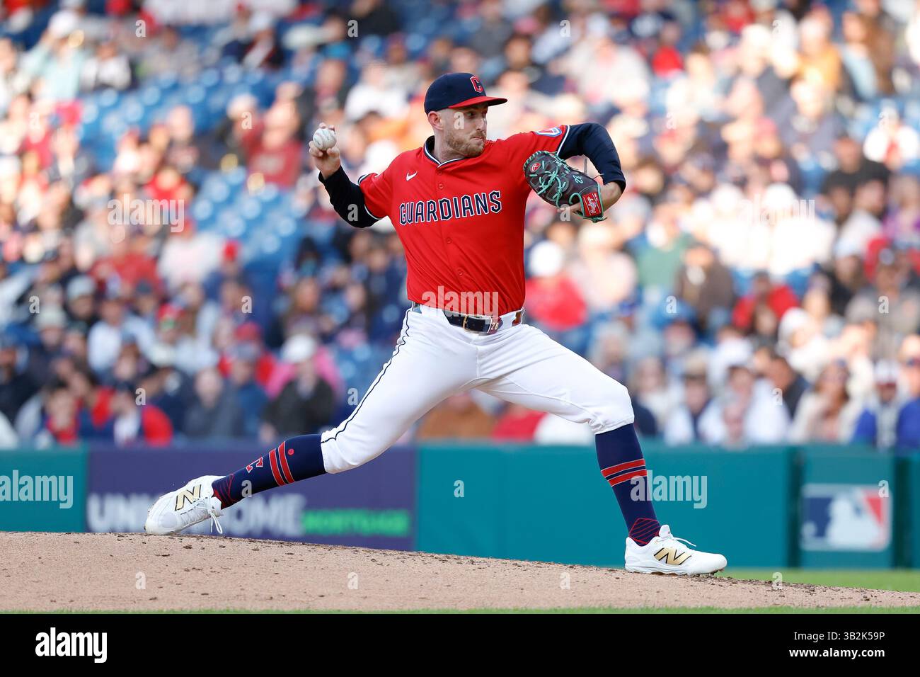 Tanner Bibee #28 of the Cleveland Guardians throws a pitch in the ...