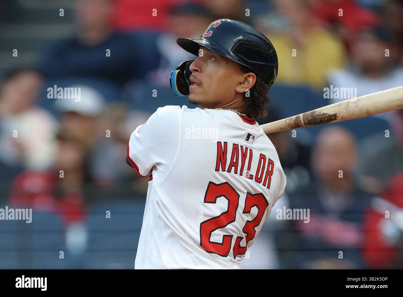 Bo Naylor #23 of the Cleveland Guardians watches a fly out in the fifth ...