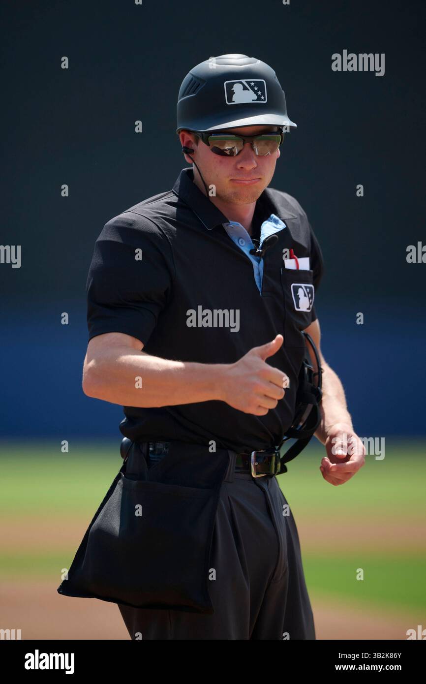 Umpire Xander Huddleston gives a thumbs up to the press box for his ...