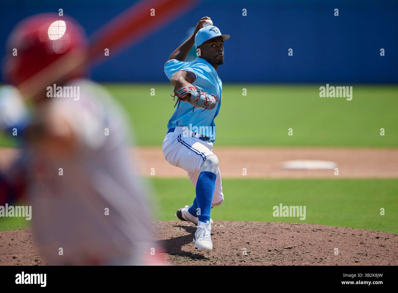 Dunedin Blue Jays pitcher Johan Simon (45) delivers a pitch during an ...