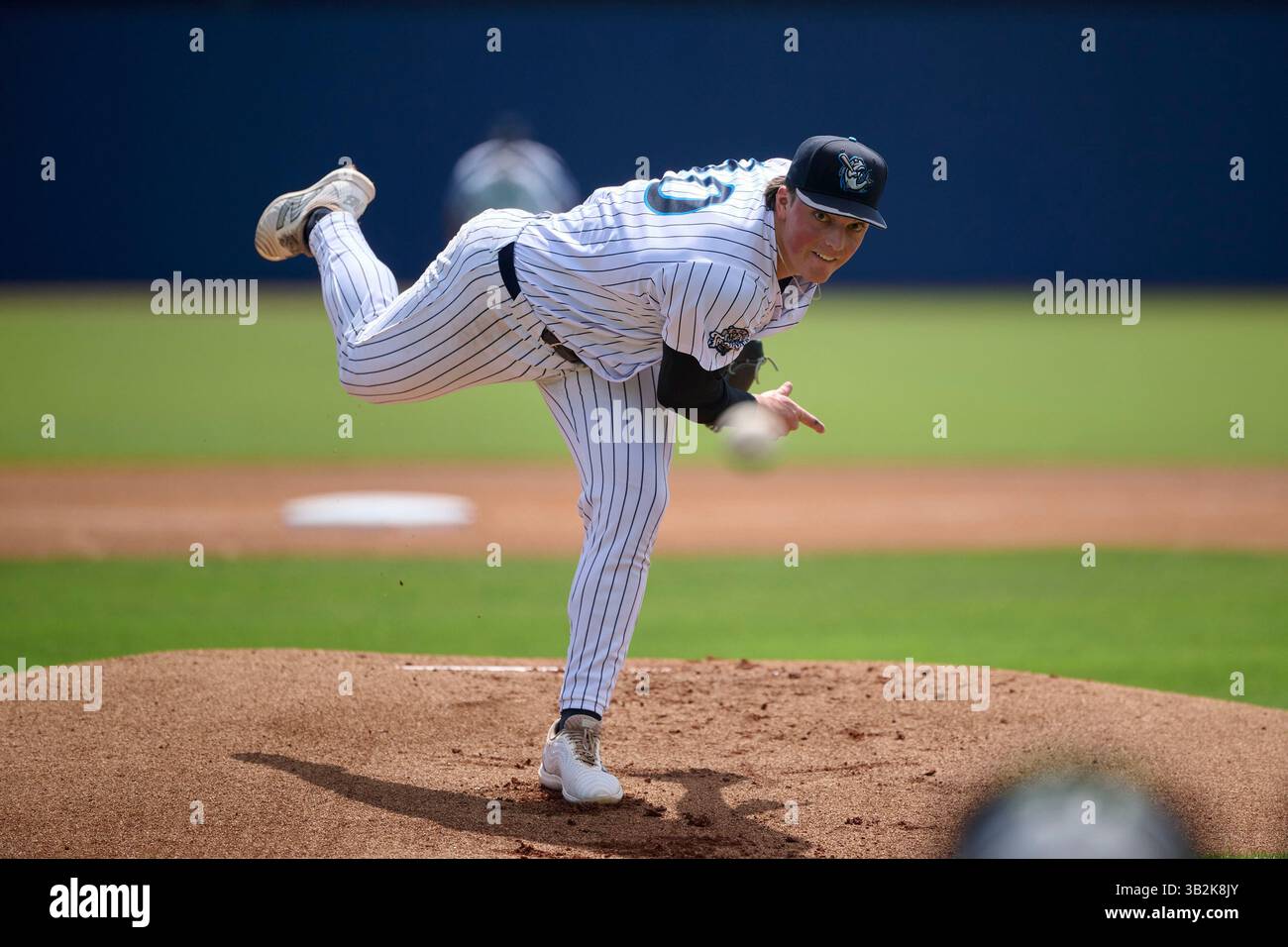 Tampa Tarpons pitcher Greysen Carter (30) delivers the first pitch of ...