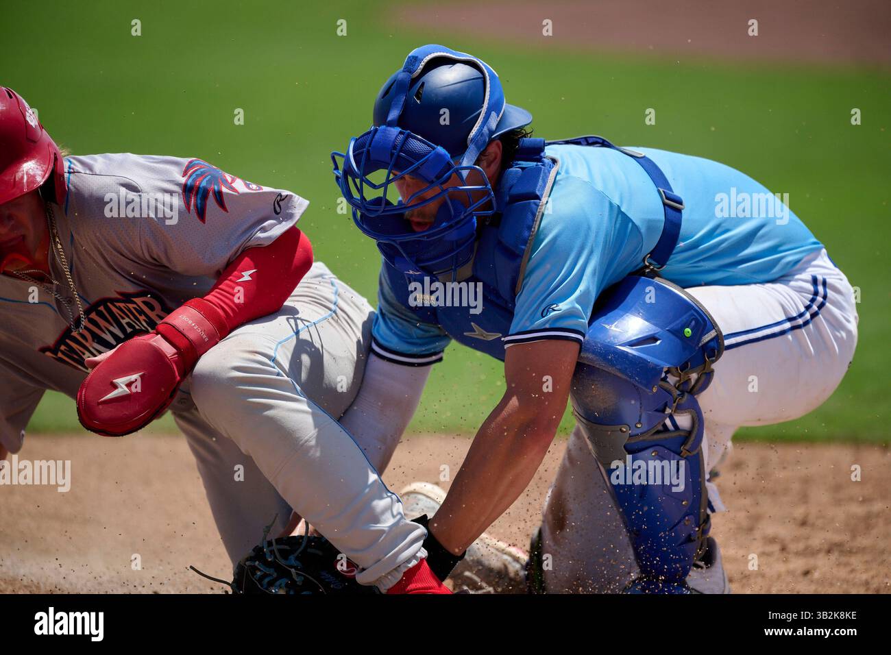 Dunedin Blue Jays catcher Brock Tibbitts (9) tags Kehden Hettiger (17 ...