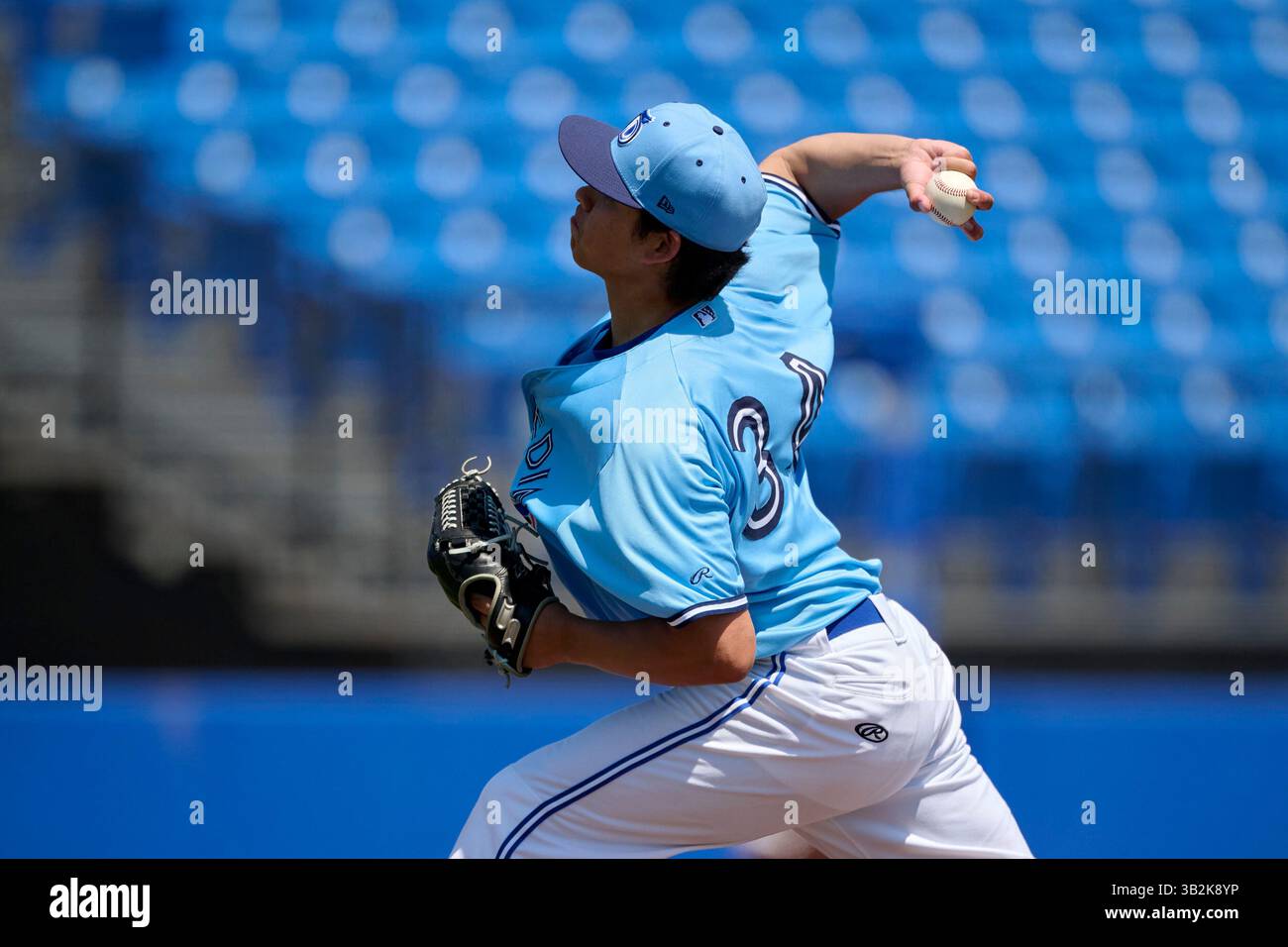 Dunedin Blue Jays pitcher Jack Eshleman (34) delivers a pitch during an MiLB Florida State ...