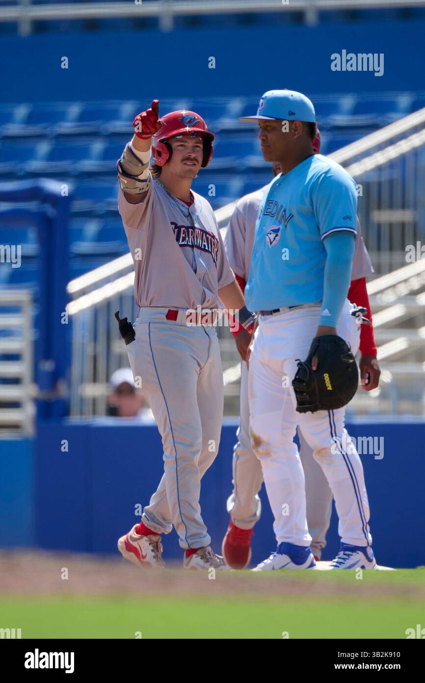 Clearwater Threshers Brady Day (10) points to his teams bench after ...
