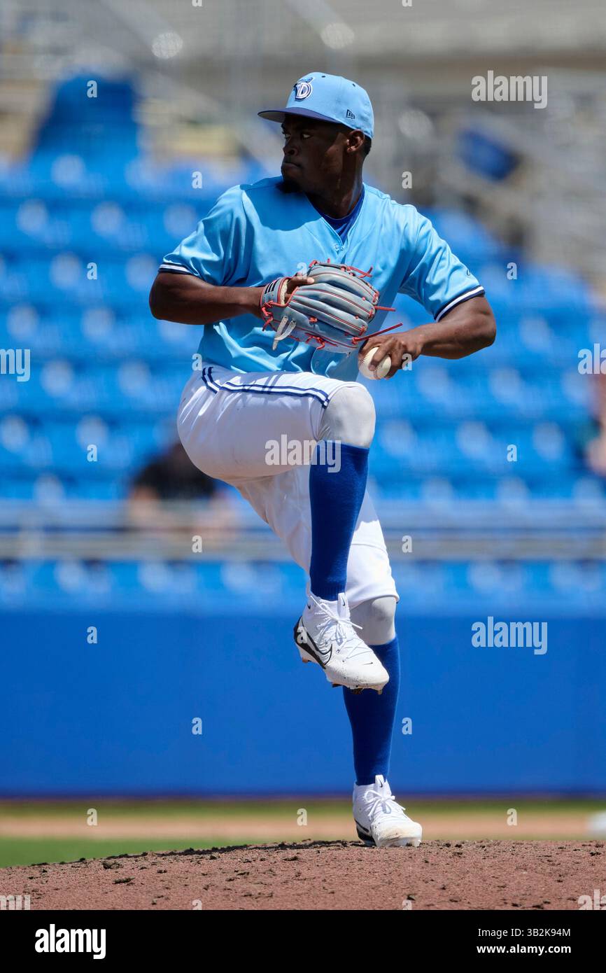 Dunedin Blue Jays pitcher Johan Simon (45) delivers a pitch during an ...
