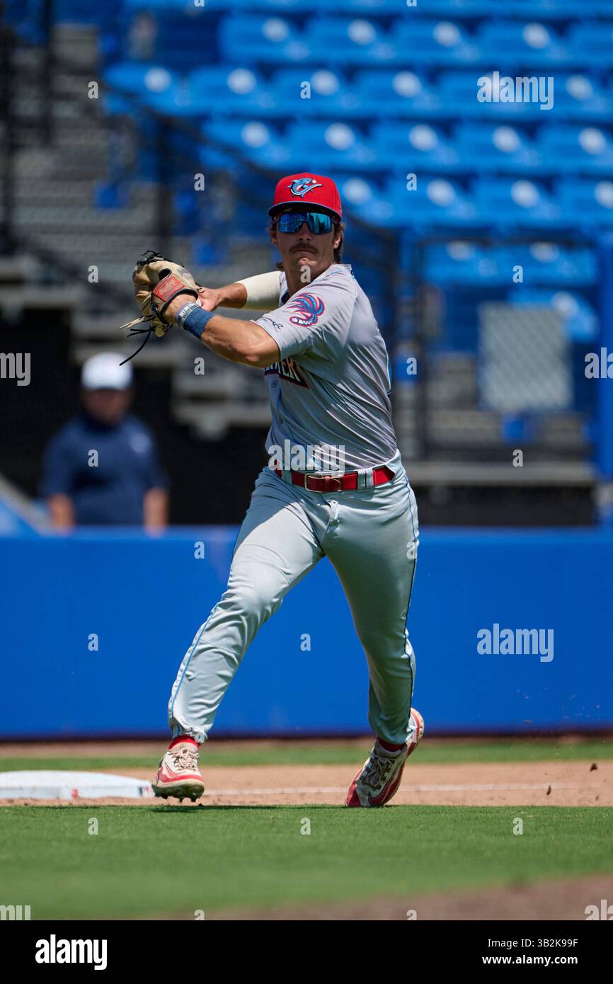 Clearwater Threshers third baseman Brady Day (10) throws to first base ...