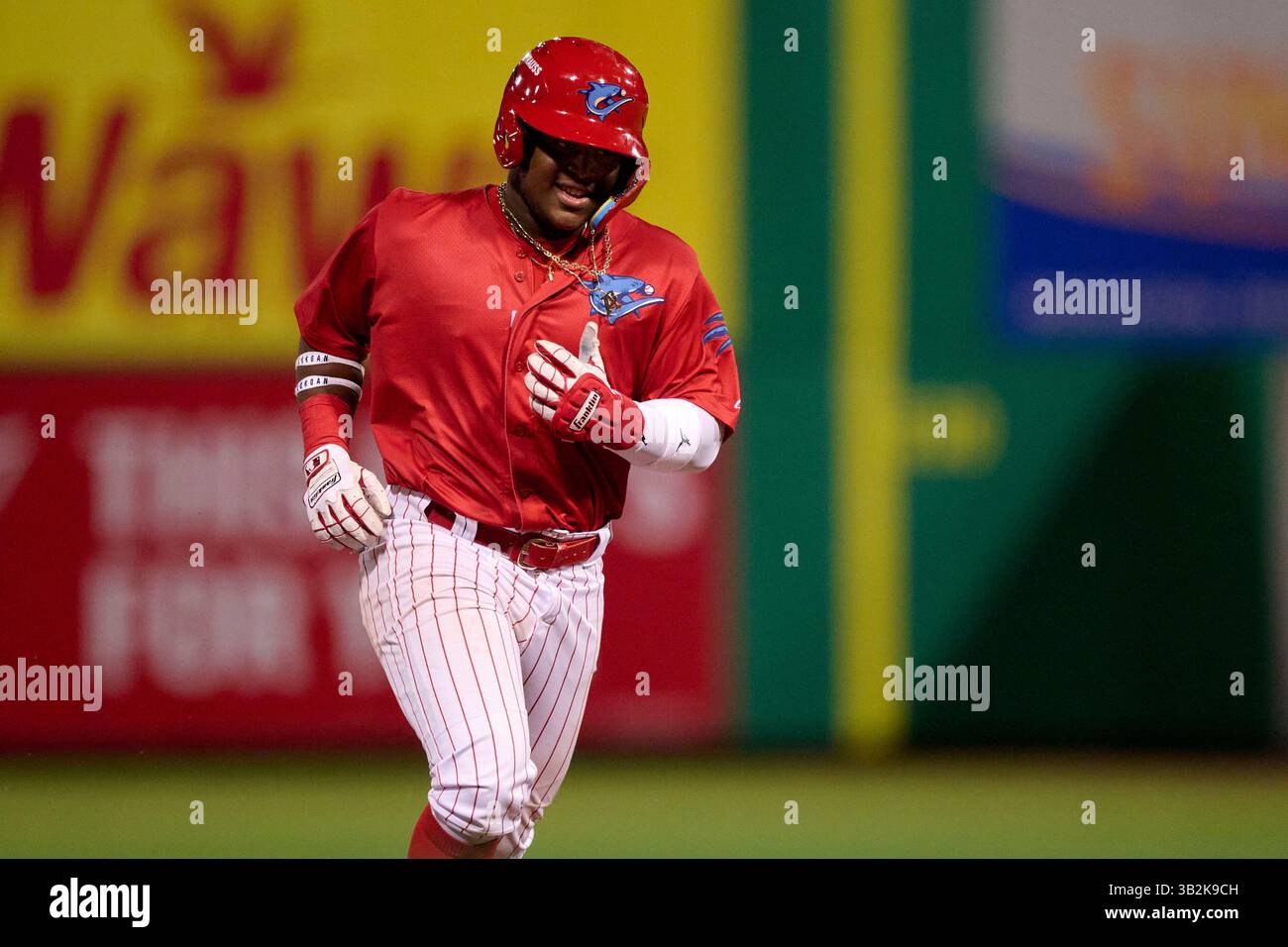Clearwater Threshers Aroon Escobar (37) rounds the bases after hitting ...
