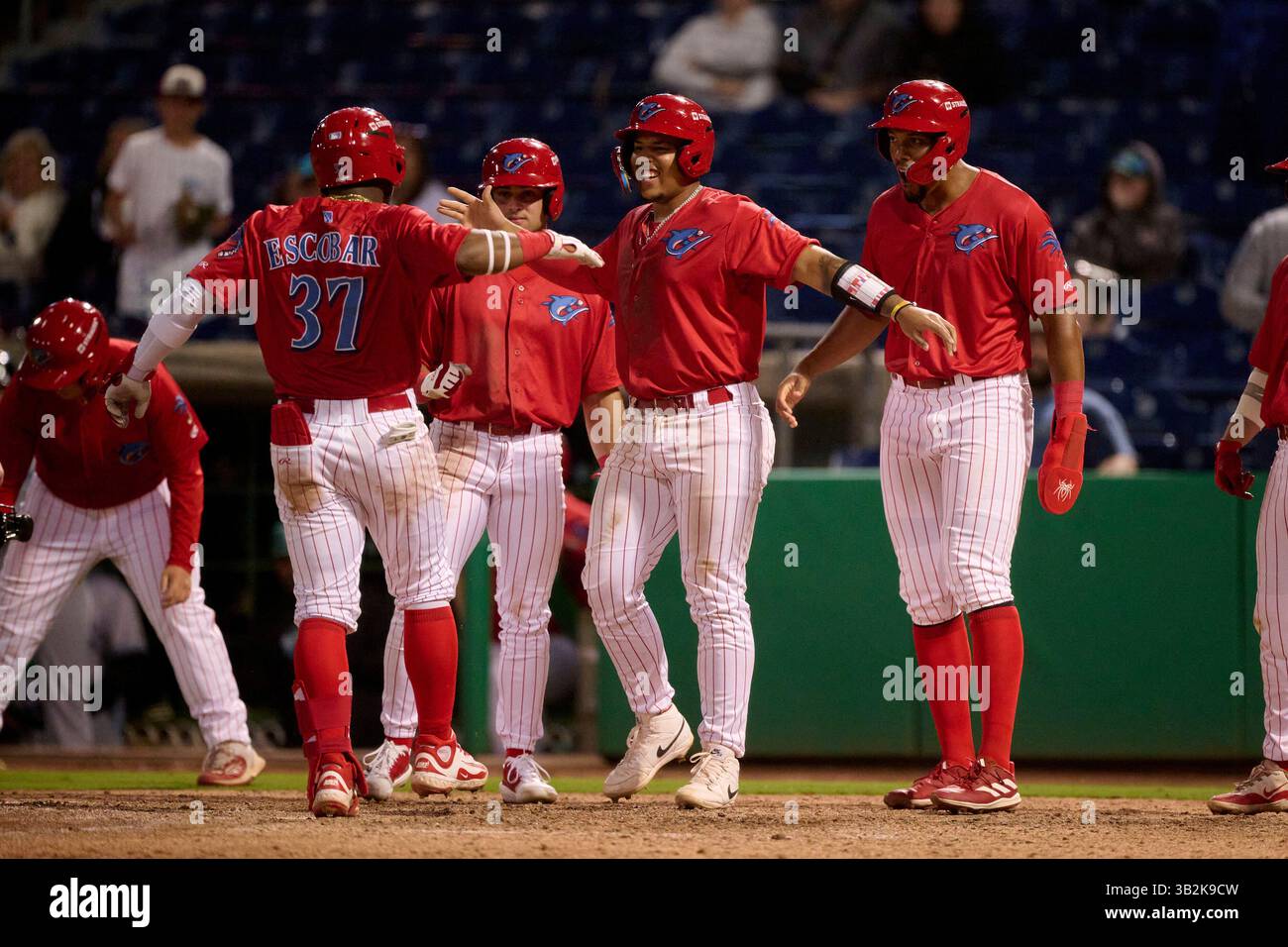 Clearwater Threshers Aroon Escobar (37) celebrates hitting a grand slam ...