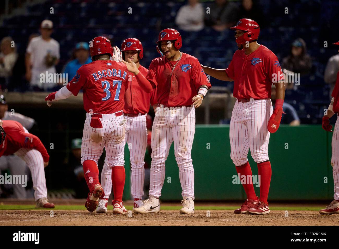 Clearwater Threshers Aroon Escobar (37) celebrates hitting a grand slam ...