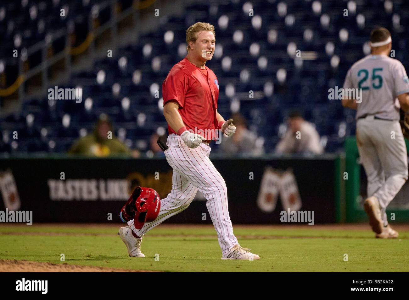 Clearwater Threshers Joel Dragoo (7) celebrates after hitting a walk ...