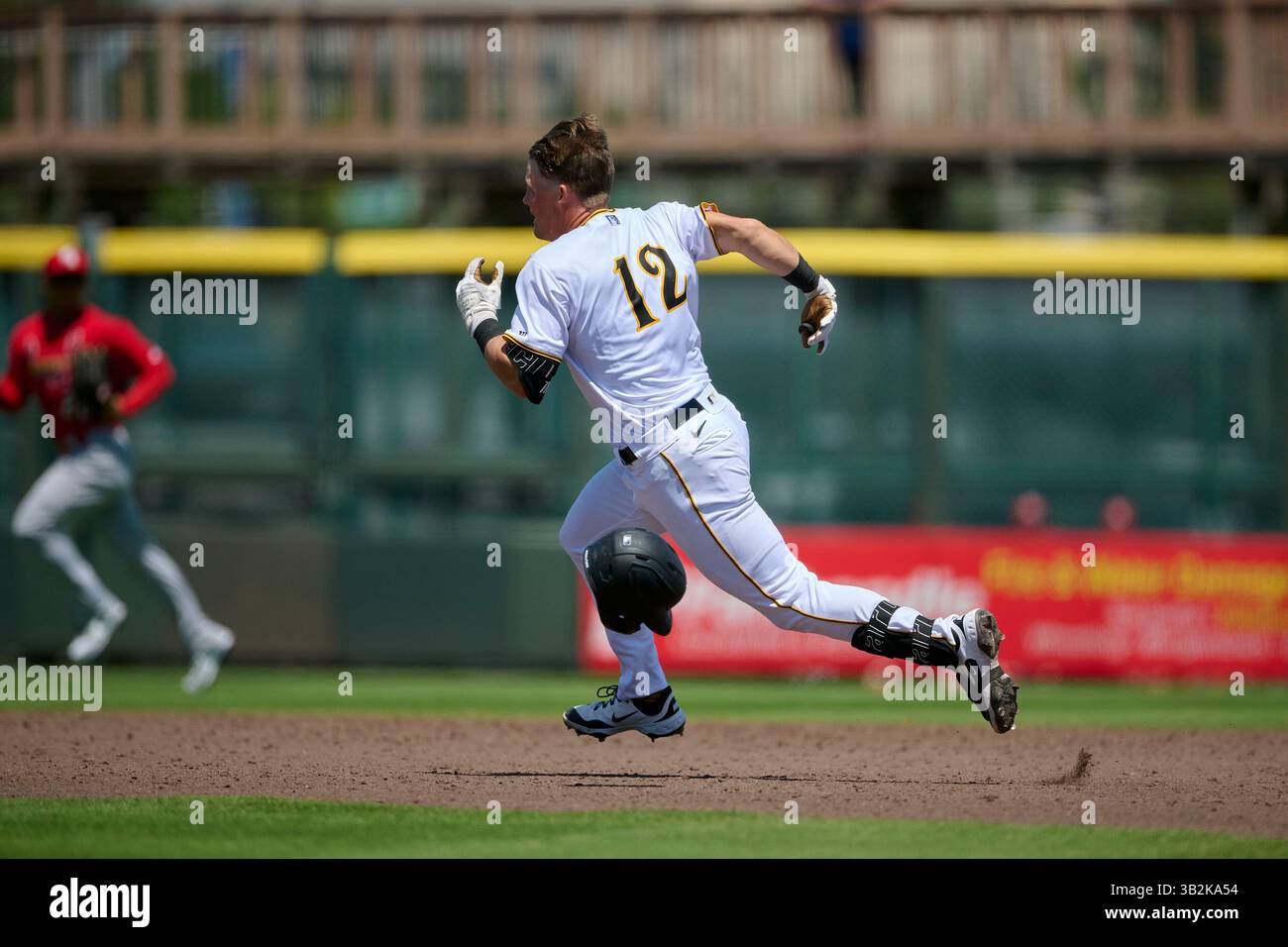 Bradenton Marauders Derek Berg (12) running the bases after hitting a ...