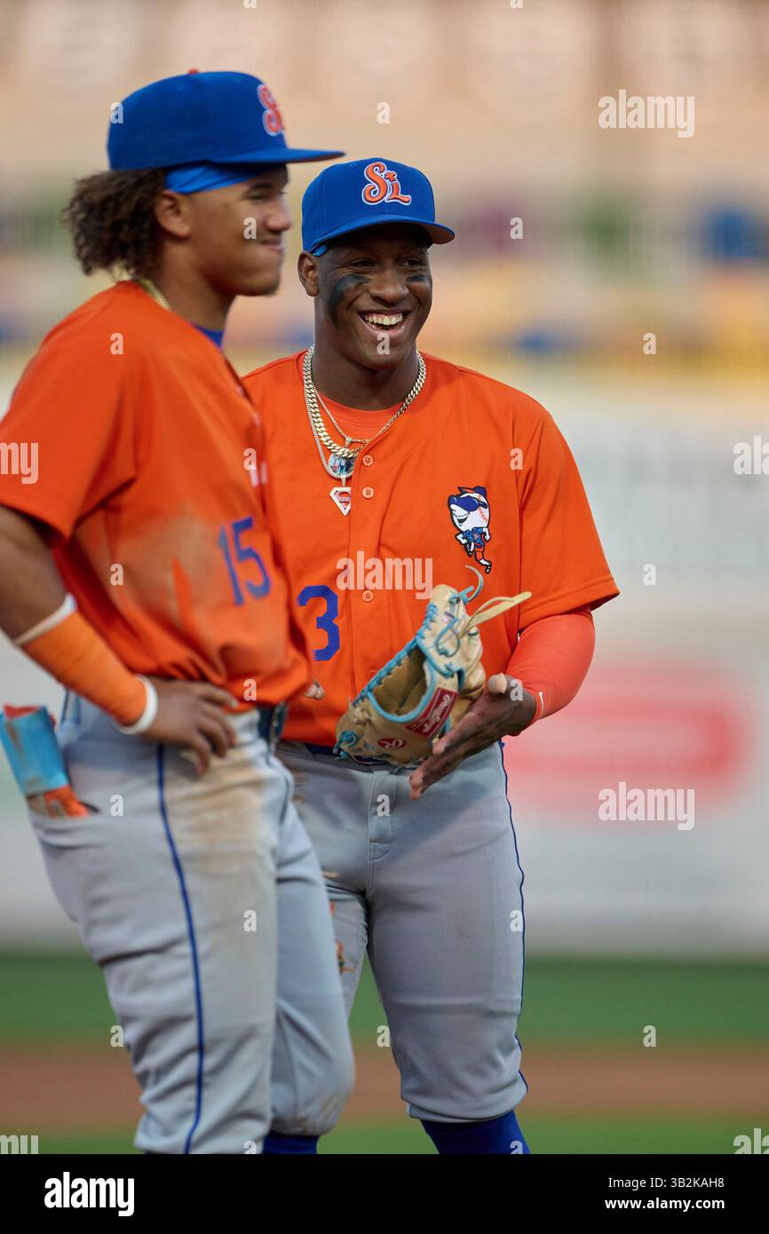St. Lucie Mets second baseman Jesus Baez (23) jokes with third baseman ...