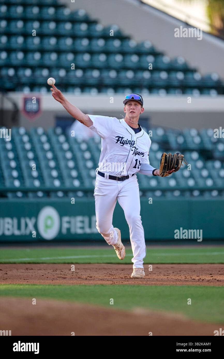 Lakeland Flying Tigers third baseman Carson Rucker (18) throws to first ...