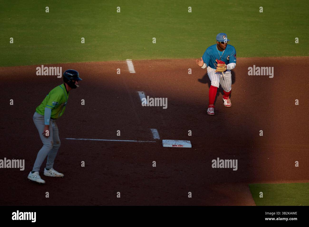 Clearwater Threshers second baseman Aroon Escobar (37) holds Ryan ...